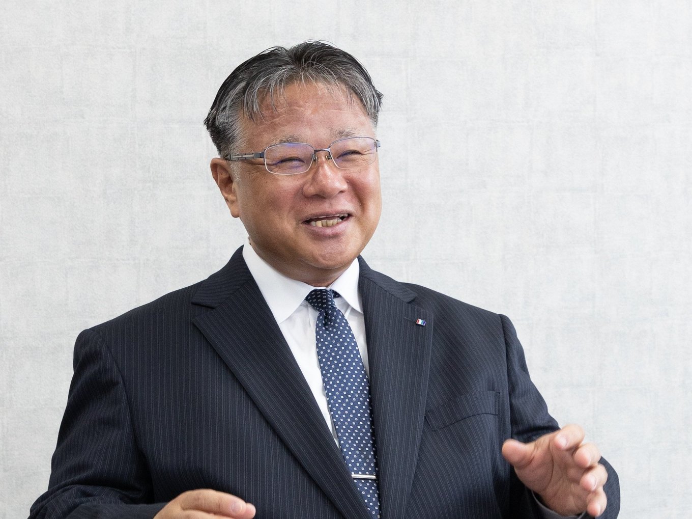 石灰 一友 氏（石友ホーム 代表取締役社長） トップ記念対談｜北日本新聞webunプラス